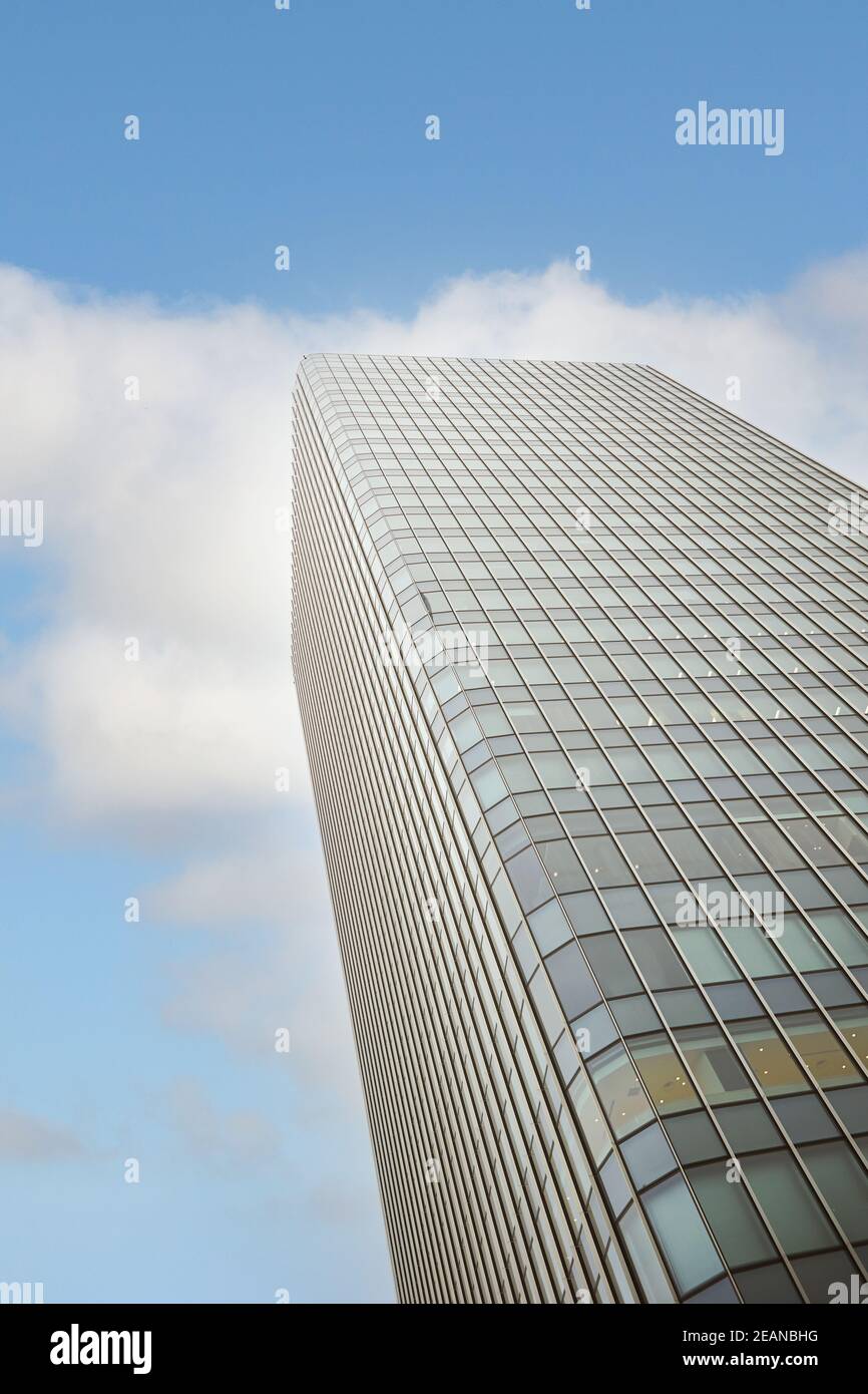 Vertical low angle of a modern business high rise building on ...