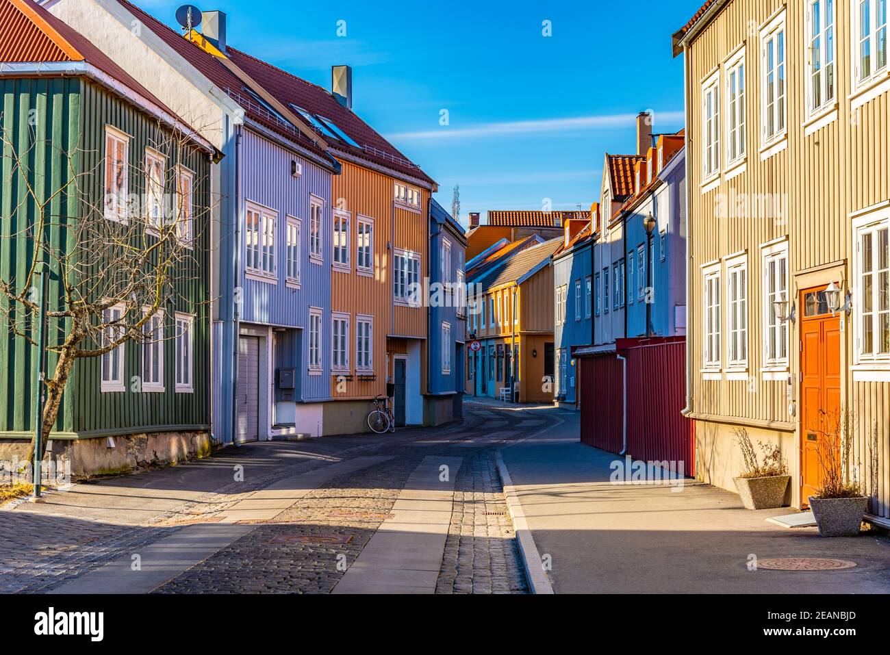 View of a narrow street in the Brygge district of Trondheim, Norway ...