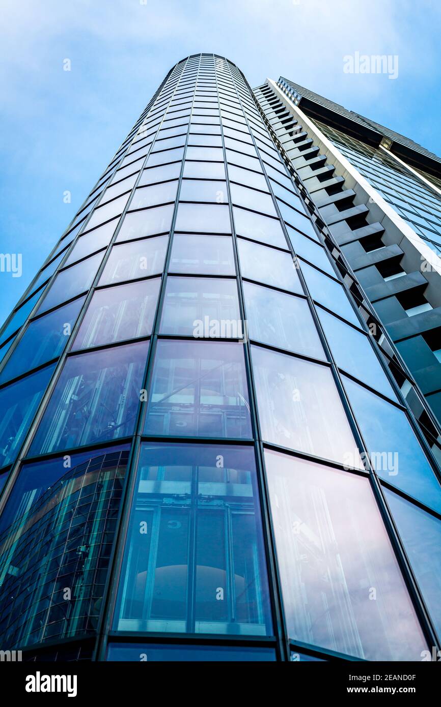 glass wall of skyscraper, blue sky Stock Photo - Alamy
