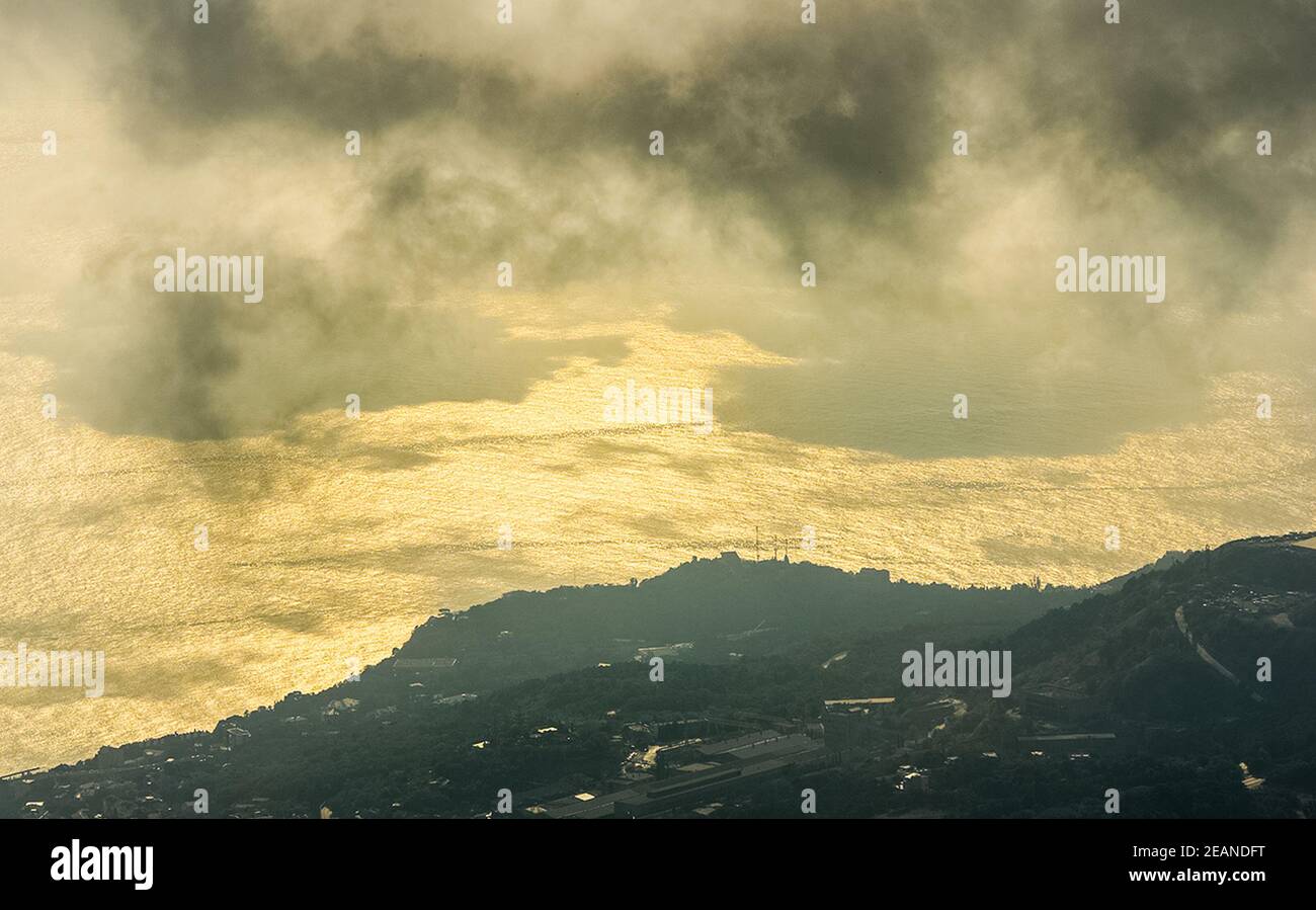 Aerial view overlooking cloudy valley hi-res stock photography and ...