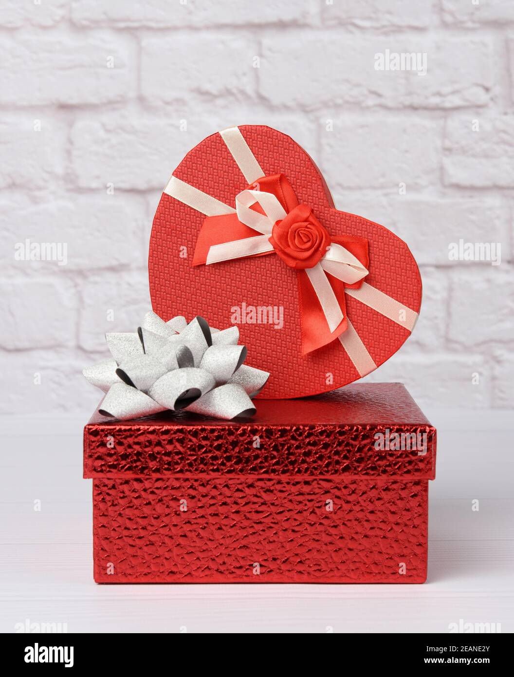 stack of various red boxes with gifts on white background Stock Photo ...