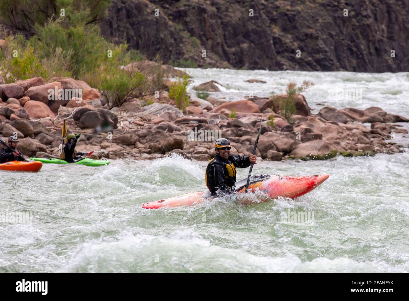 Shooting rapids in a kayak on the Colorado River, Grand Canyon National ...