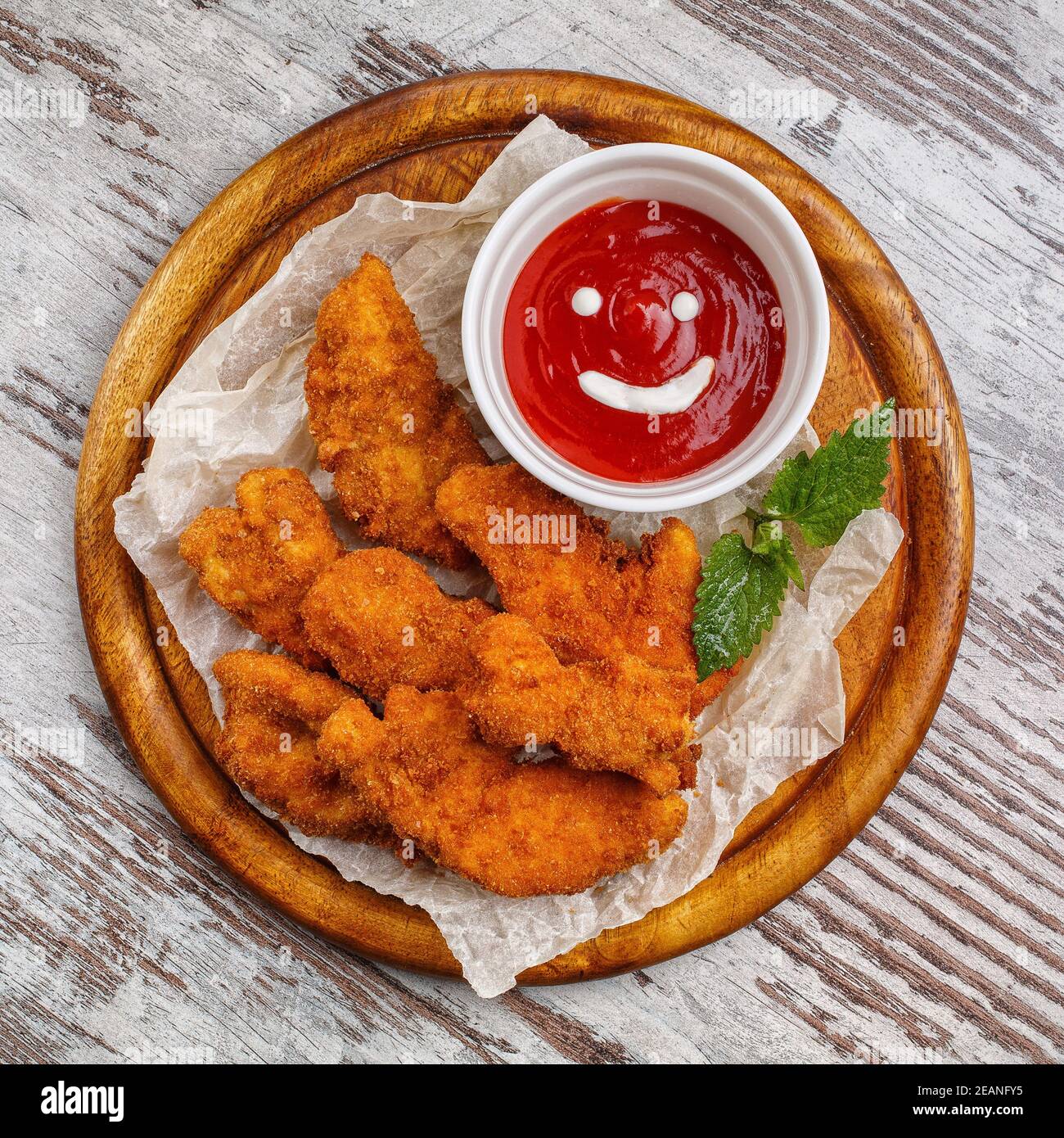 Baked chicken wings with sauce-smiley. Food background Stock Photo - Alamy