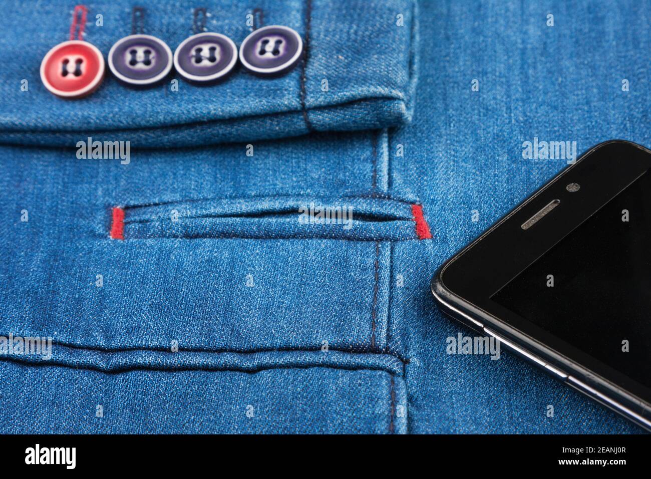 Texture denim jacket with pocket and sleeves and mobile phone Stock ...