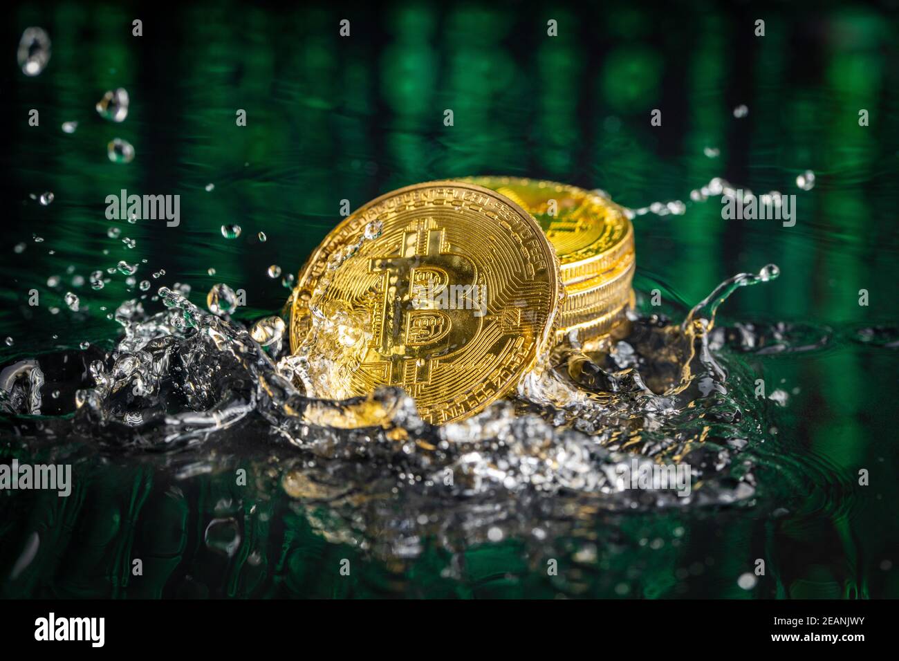 Gold bitcoin coin falling to water. Bitcoin and water splash Stock ...
