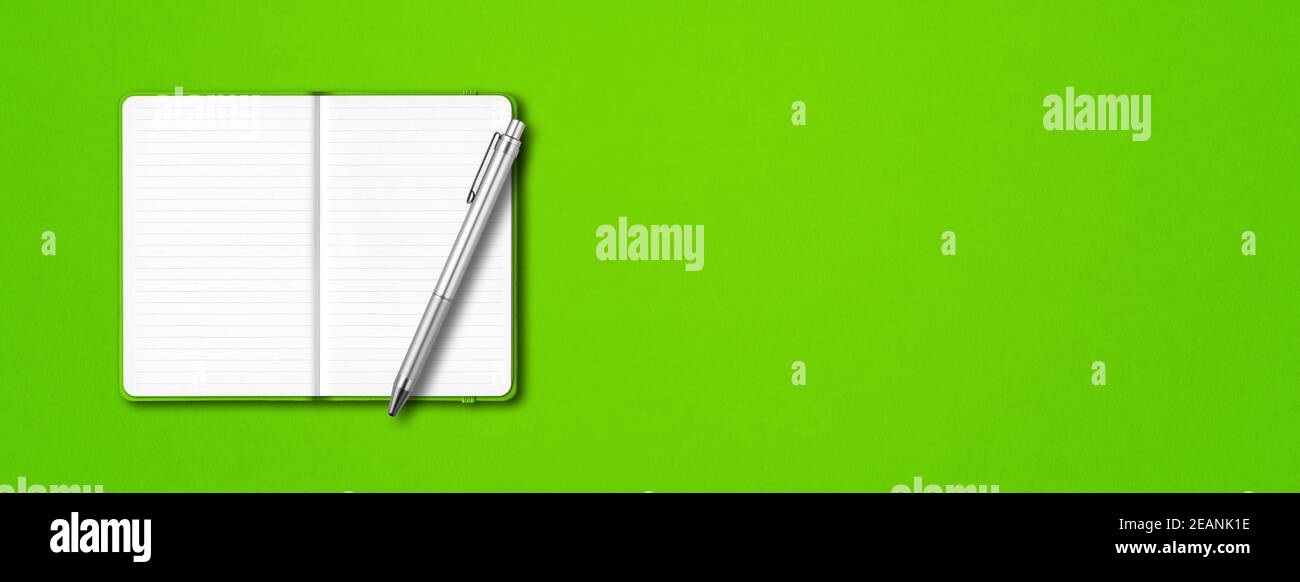 Green open notebook with a pen isolated on colorful background ...