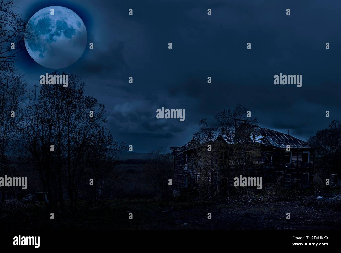 The Haunted House with Full Moon Stock Photo - Alamy