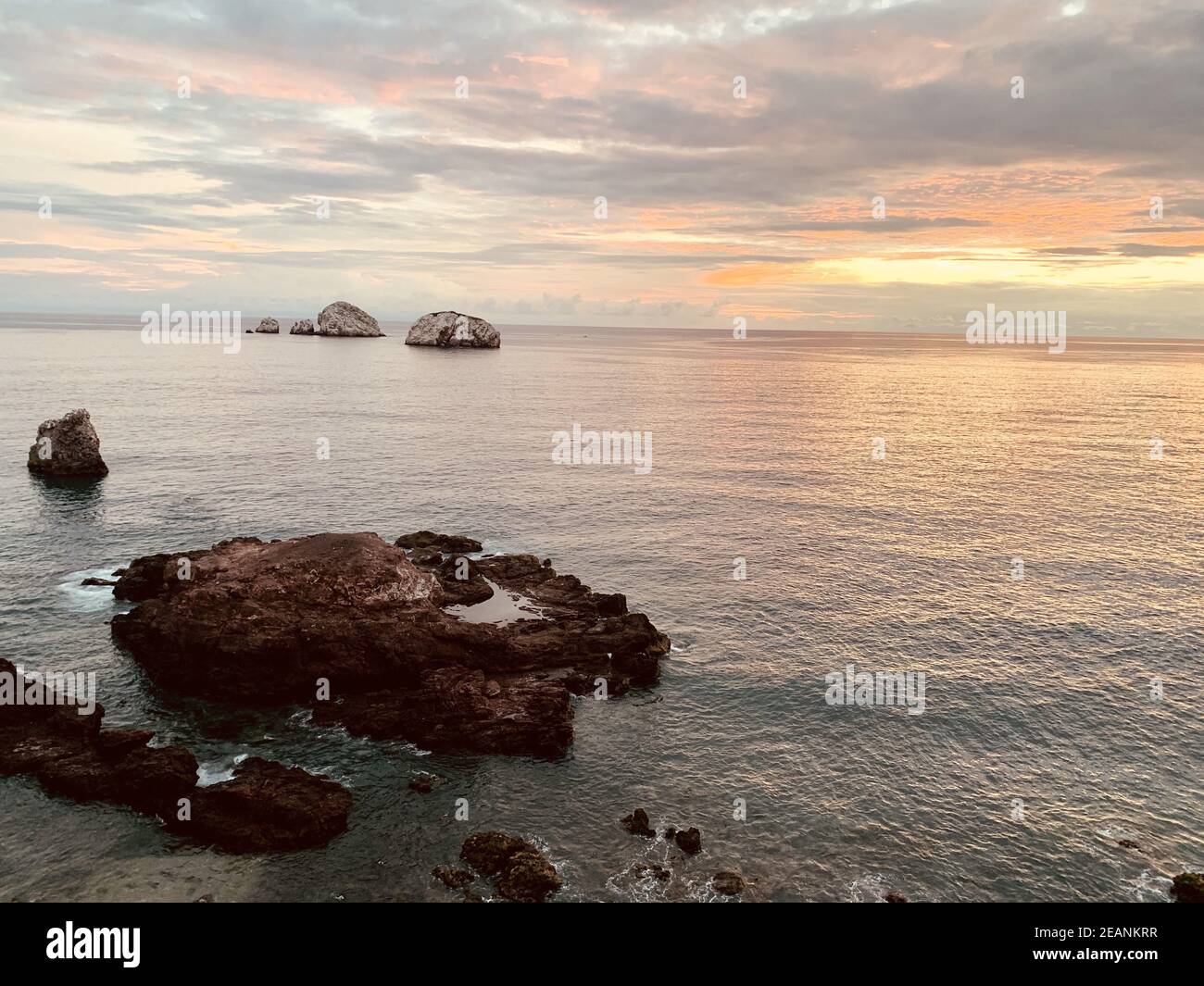 Mesmerizing scenery of a sea at sunset Stock Photo - Alamy