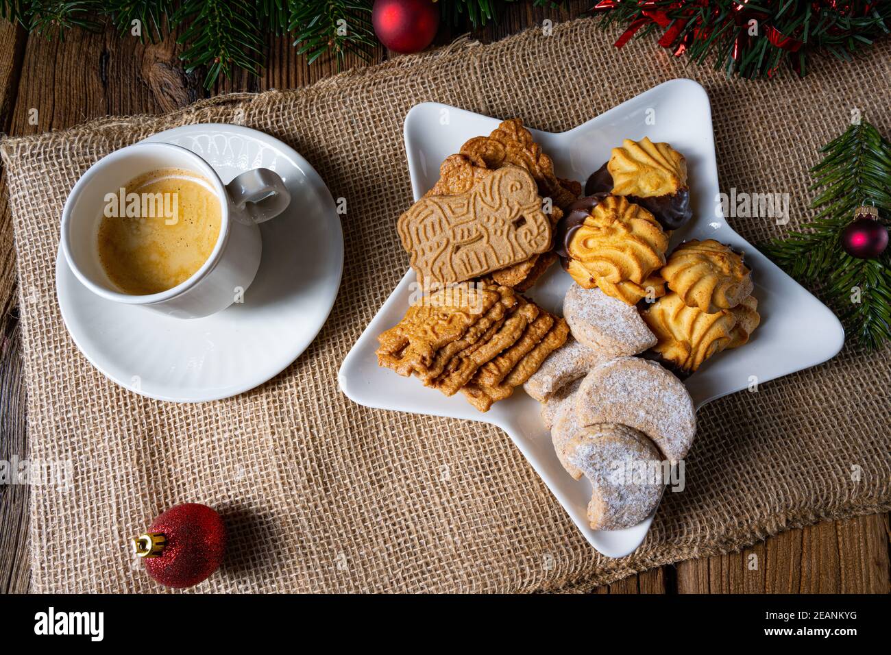 Different types of biscuits with rustic Christmas decorations Stock ...