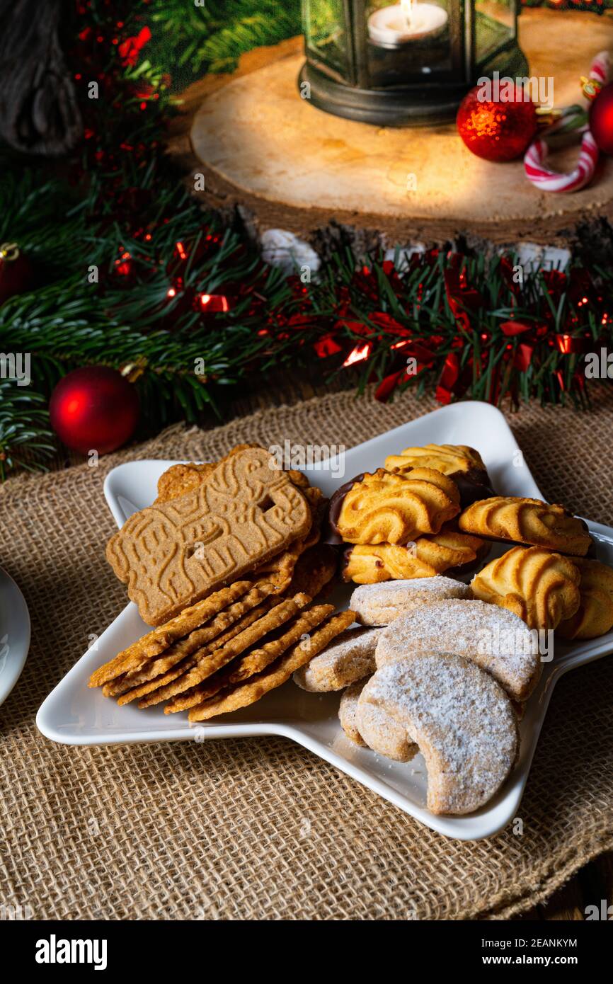 Different types of biscuits with rustic Christmas decorations Stock ...