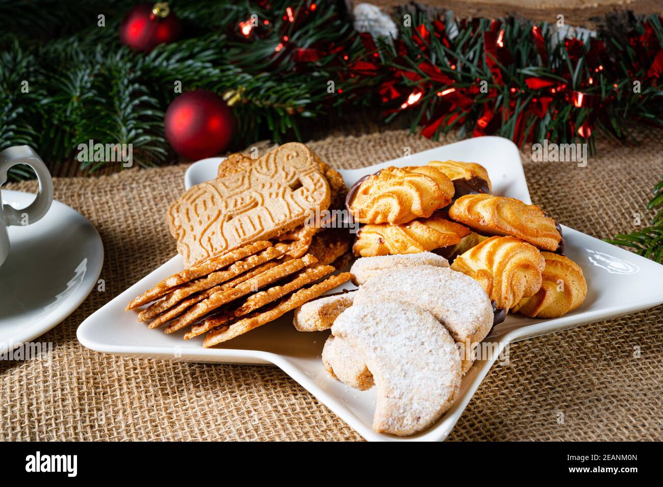 Different types of biscuits with rustic Christmas decorations Stock ...