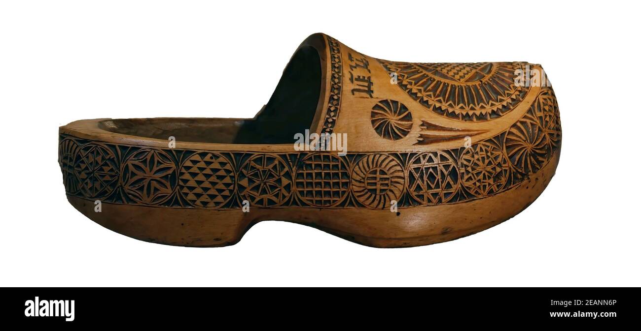 Closeup of a vintage sabot wooden shoe from the Netherlands isolated on ...