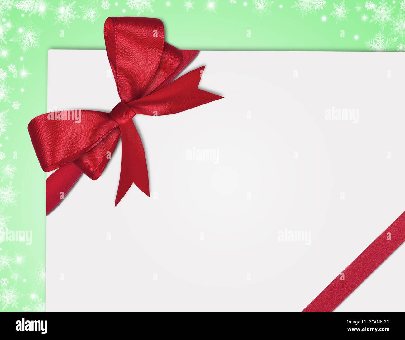 Gift card note with ribbon on isolated background Stock Photo - Alamy