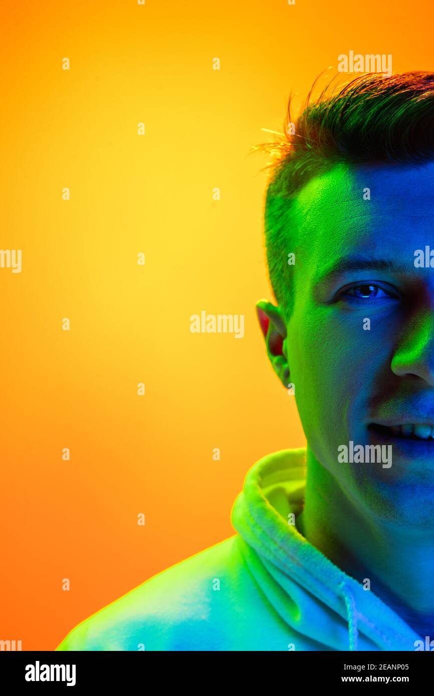 Smiling. Caucasian man's portrait isolated on yellow studio background ...