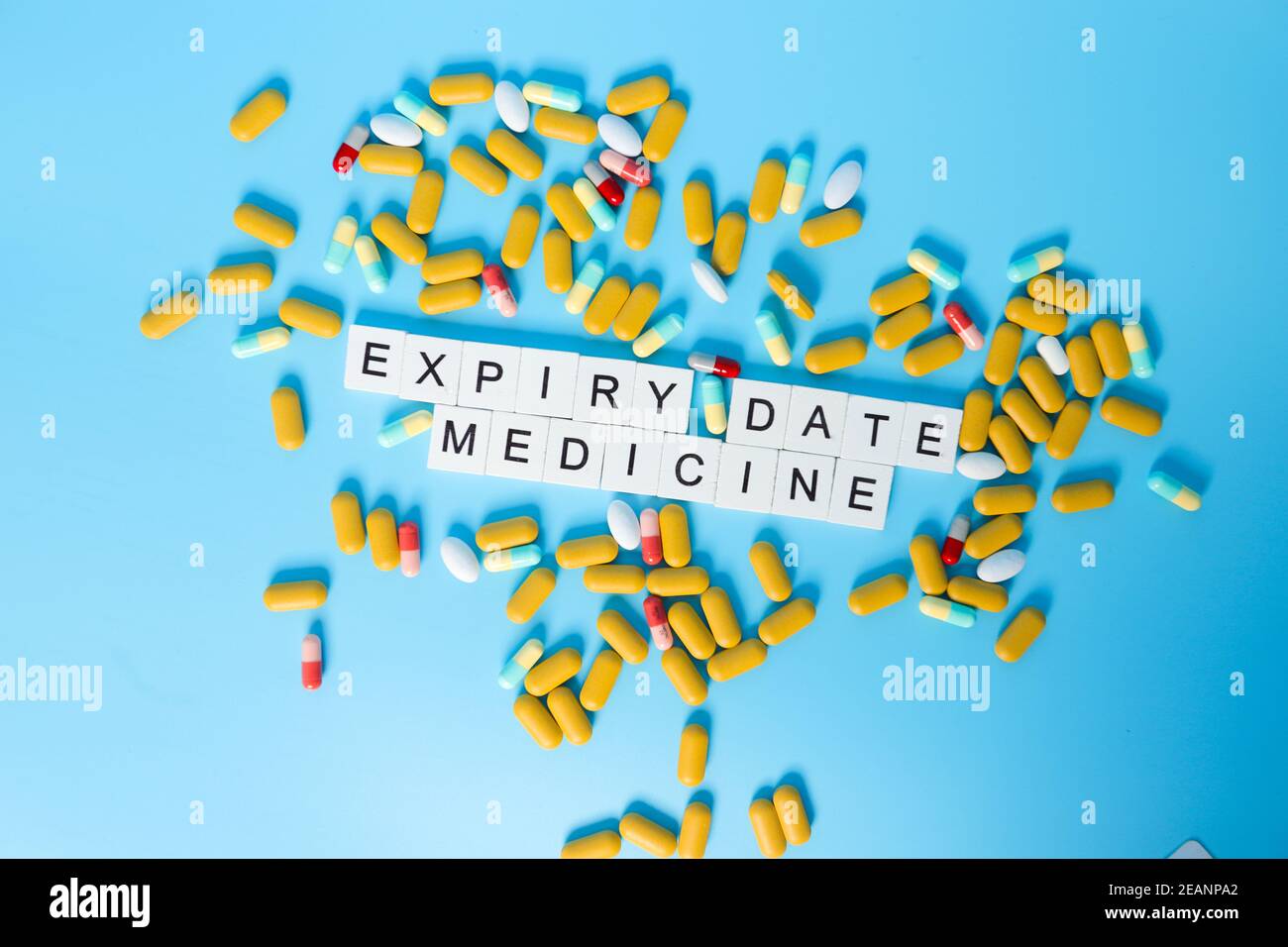 the word of EXPIRY DATE MEDICINE with Pill on blue Background Stock ...