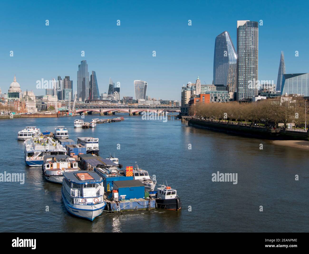 City skyline and River Thames from Waterloo Bridge, London, England ...