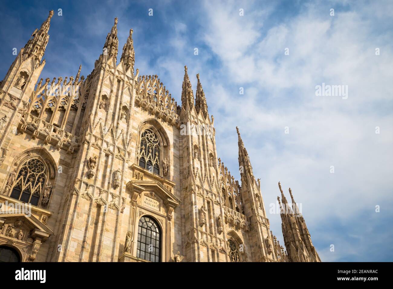 Milan Cathedral (Duomo di Milano) with blue sky and sunset light Stock ...