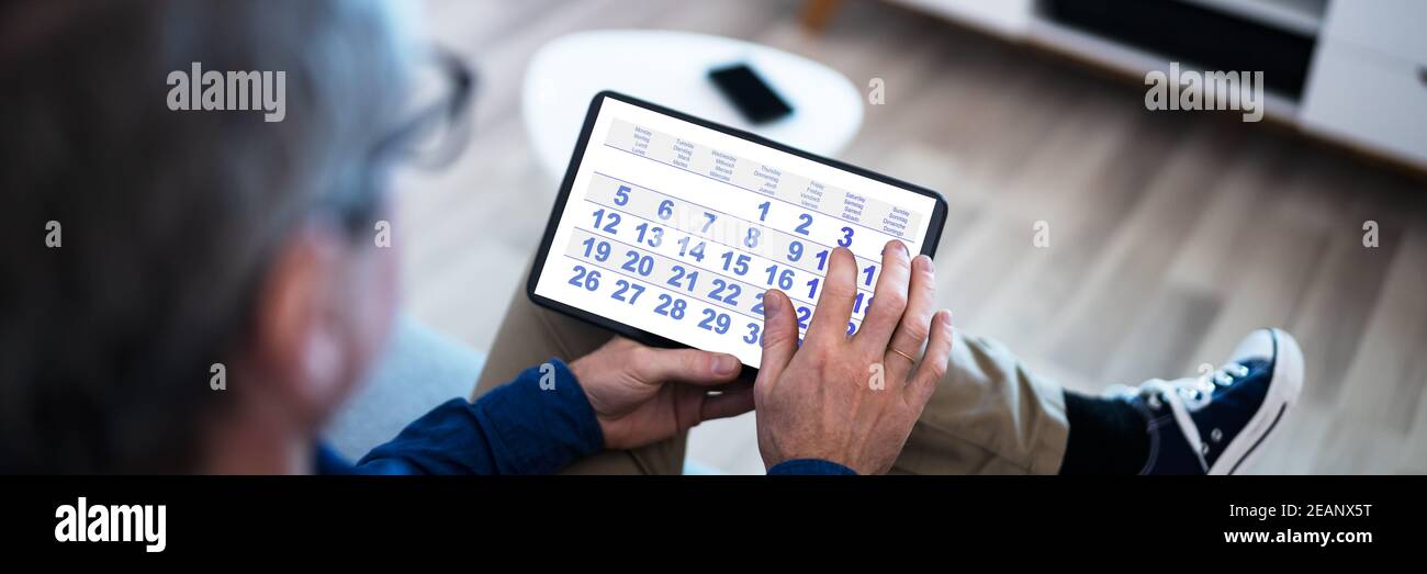 Man Using Calendar Agenda Stock Photo - Alamy