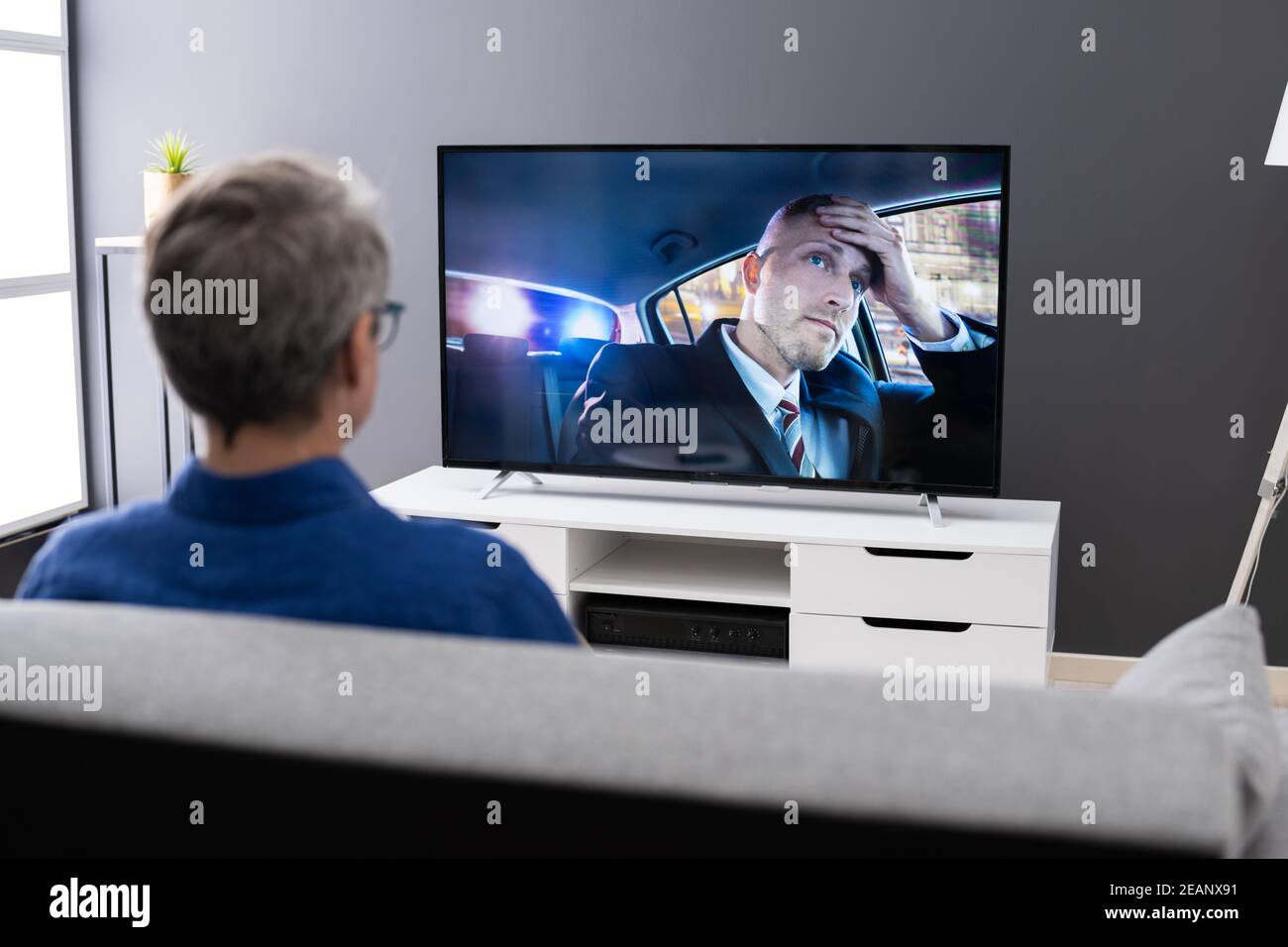 Elderly man streaming watching hi-res stock photography and images - Alamy