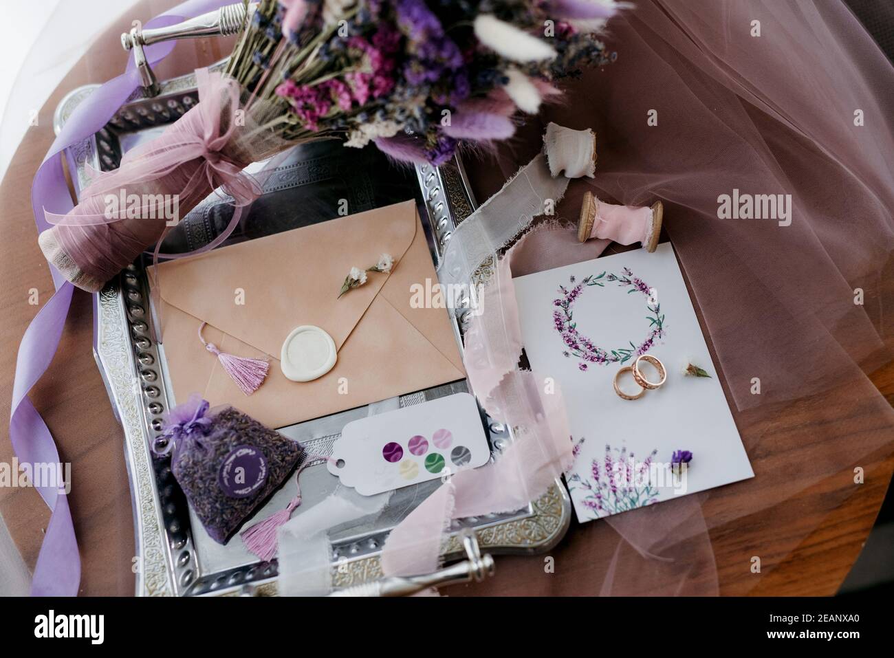 wedding rings with wedding decor Stock Photo - Alamy