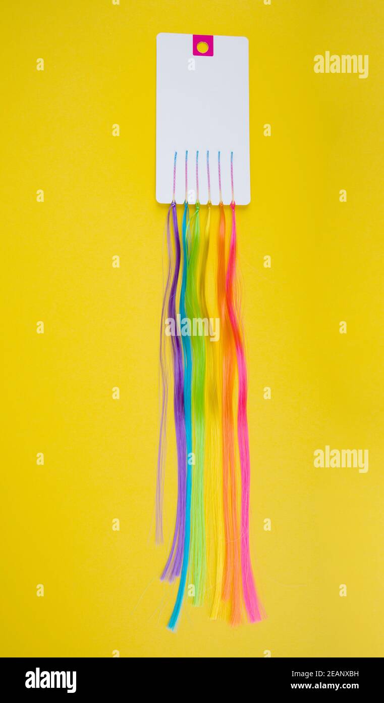 Artificial colored strands of hair Stock Photo - Alamy