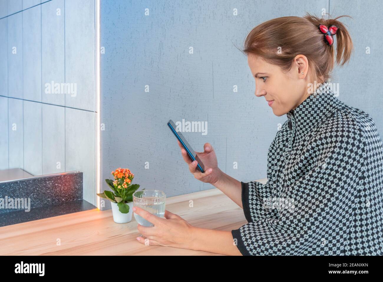Blogger woman using mobile phone for photo in cafe. Influencer female ...