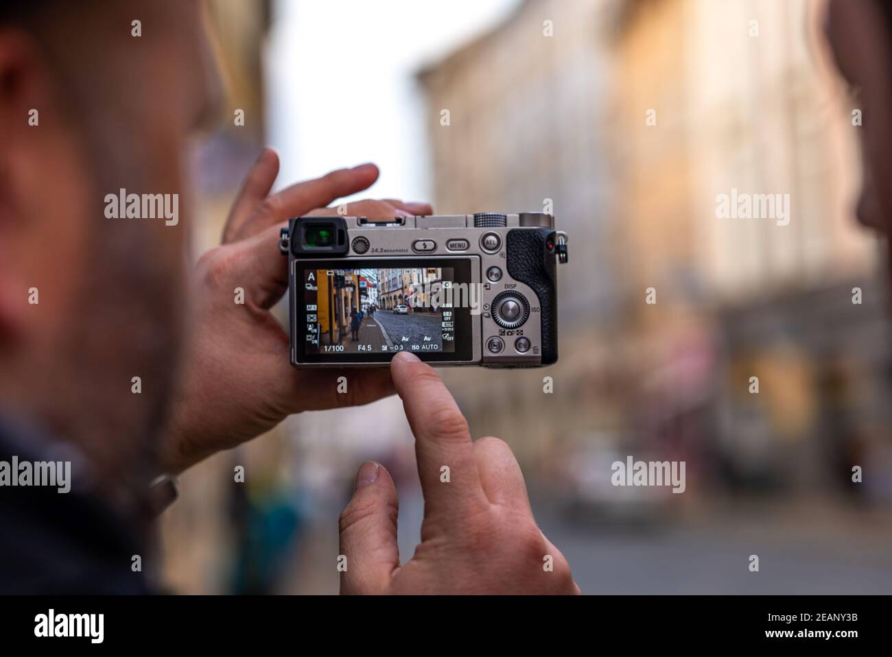 check the image on the digital camera display Stock Photo - Alamy