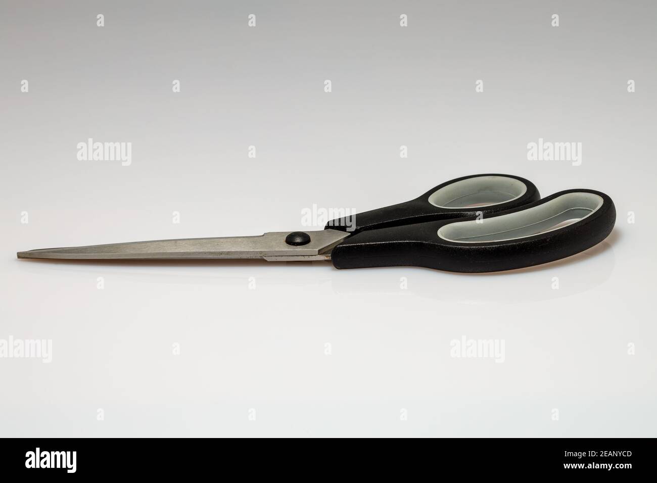 A scissor on a white background Stock Photo - Alamy