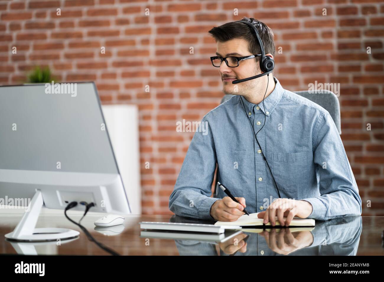 Happy man assistant call hi-res stock photography and images - Alamy