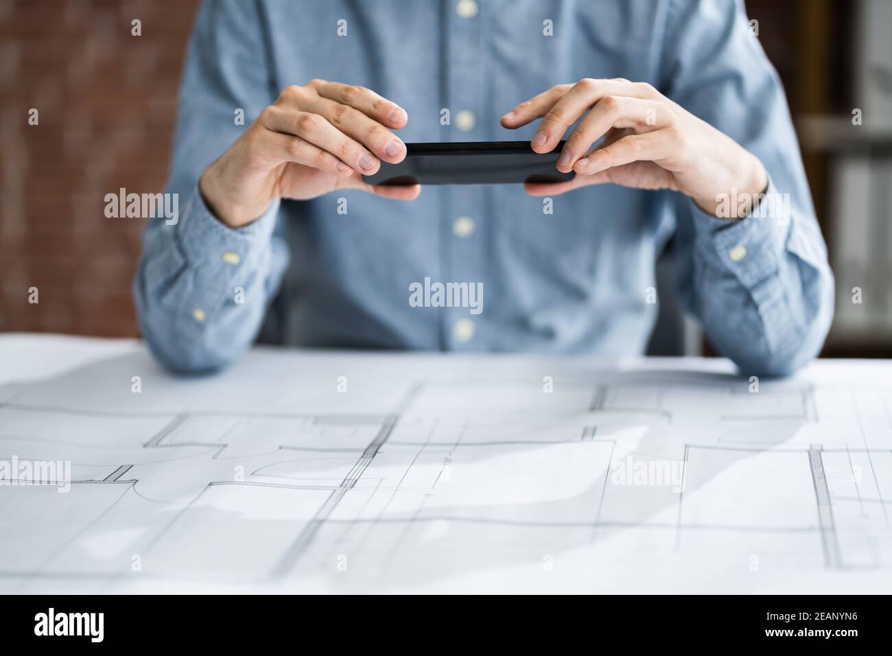 Scanning Blueprint Plan Document Using Phone Stock Photo - Alamy