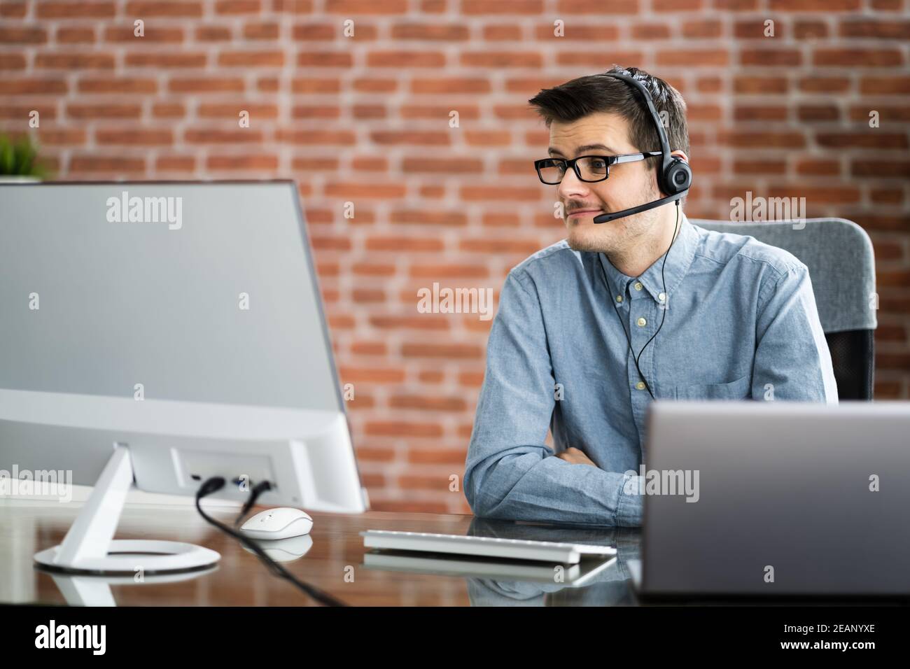 Virtual Personal Assistant Man Making Video Call Stock Photo - Alamy