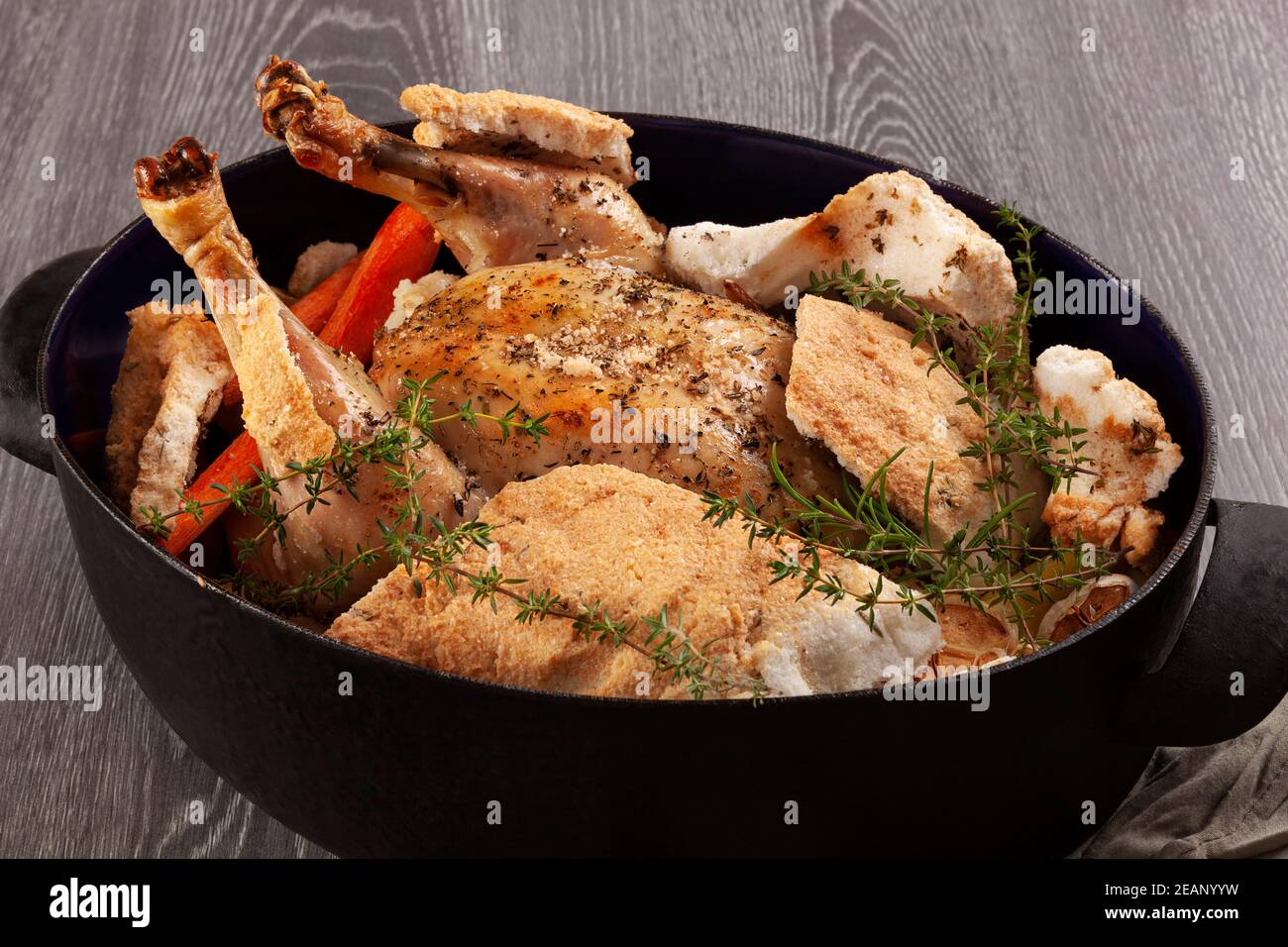 Salt crusted chicken with vegetable Stock Photo - Alamy