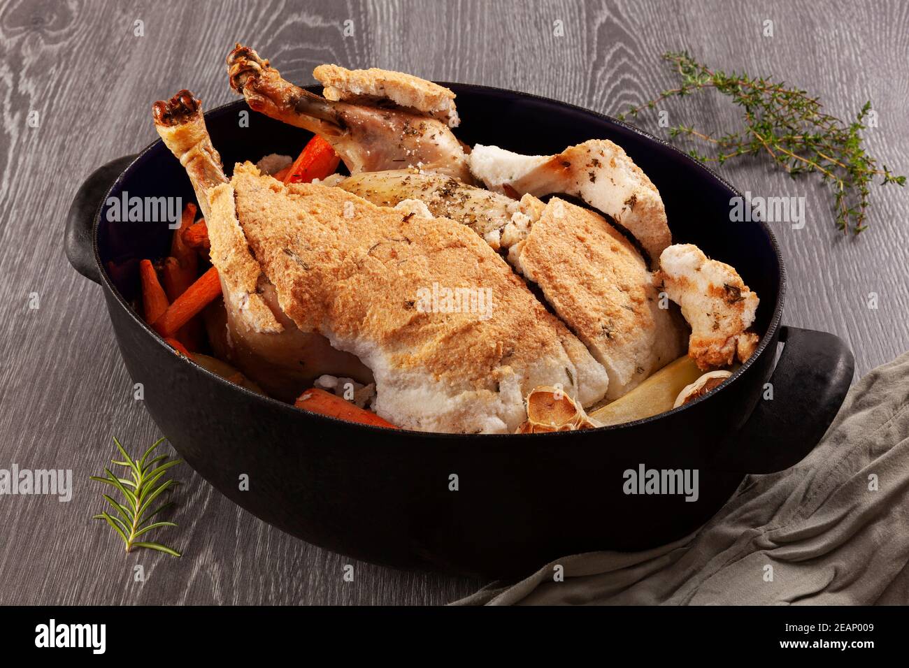 Salt crusted chicken with vegetable Stock Photo - Alamy