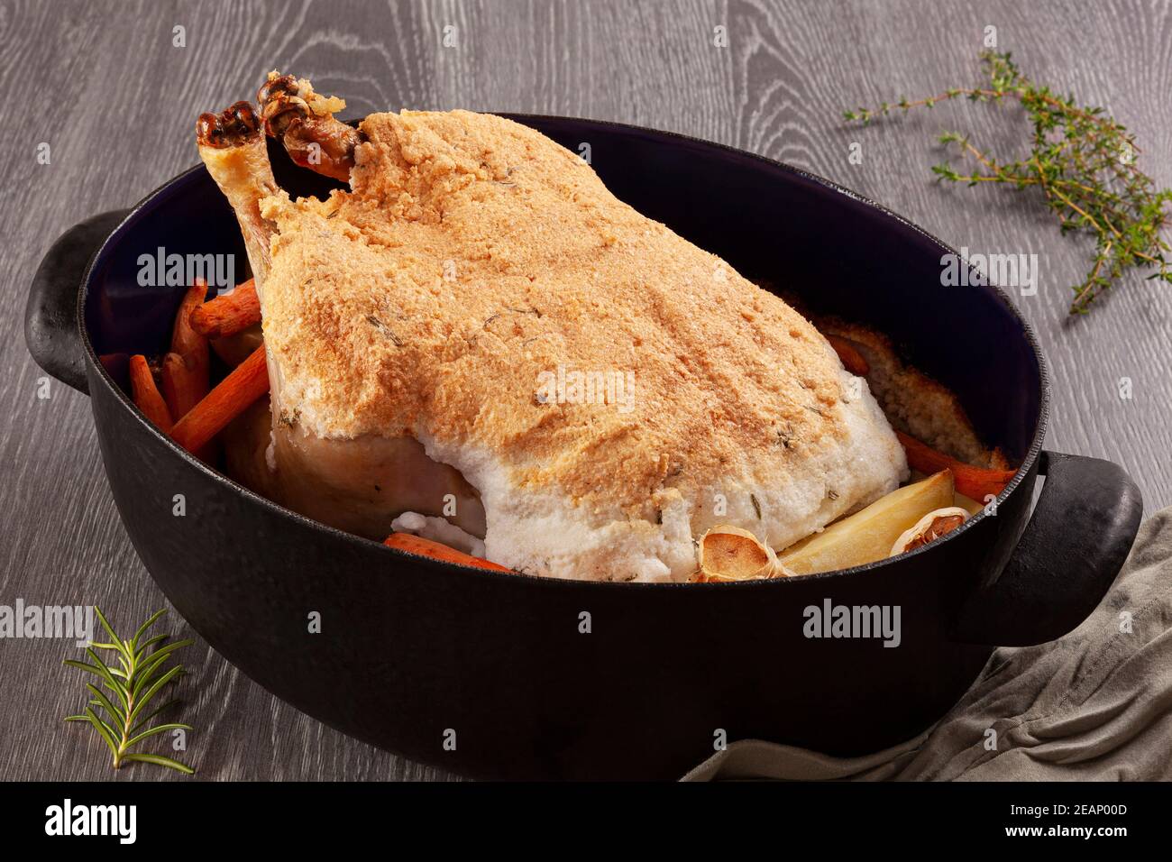 Salt crusted chicken with vegetable Stock Photo - Alamy