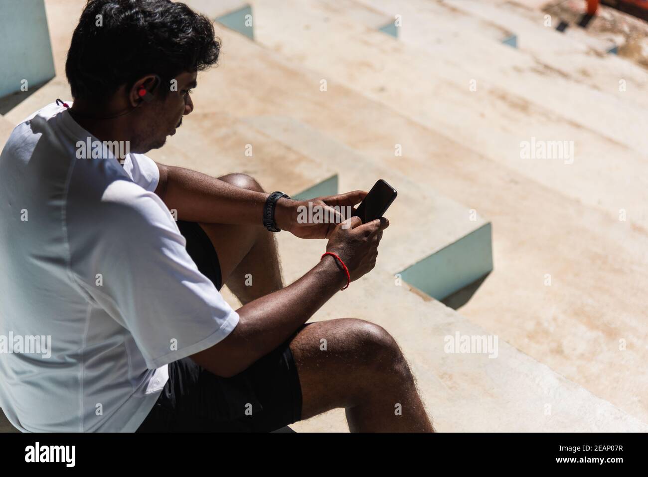 sport runner black man wear modern time smart watch Stock Photo - Alamy