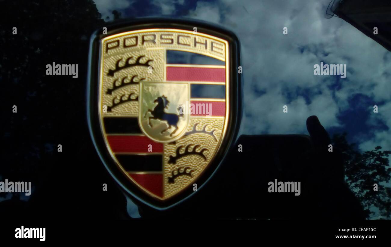 Porsche Company Logo On Porsche Car High Resolution Stock Photography ...
