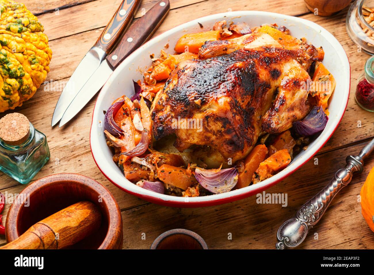 Baked partridge with pumpkin Stock Photo - Alamy