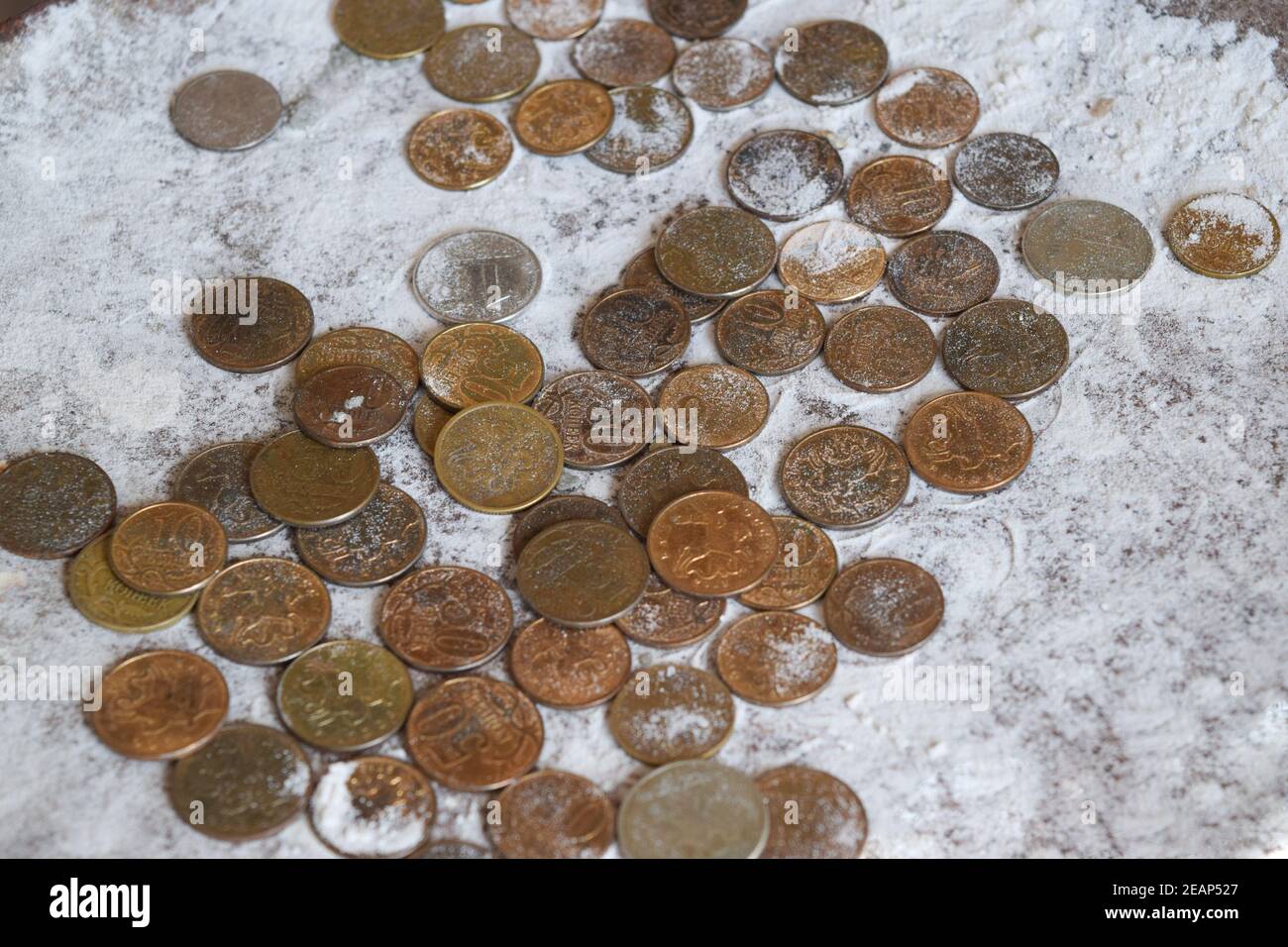Coins in the flour in the balance. Rubles and kopecks Stock Photo - Alamy