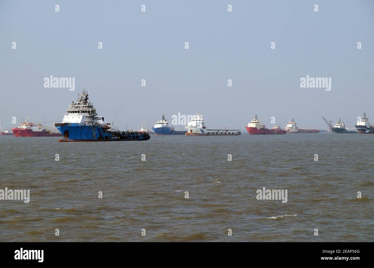 Commercial ship at anchor in the Arabian Sea outside Mumbai, India ...