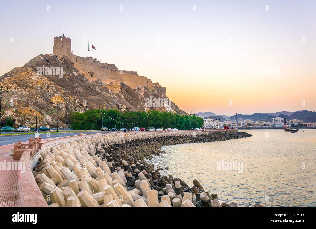 View of a fort in Muttrah district of Muscat during sunset, Oman Stock ...
