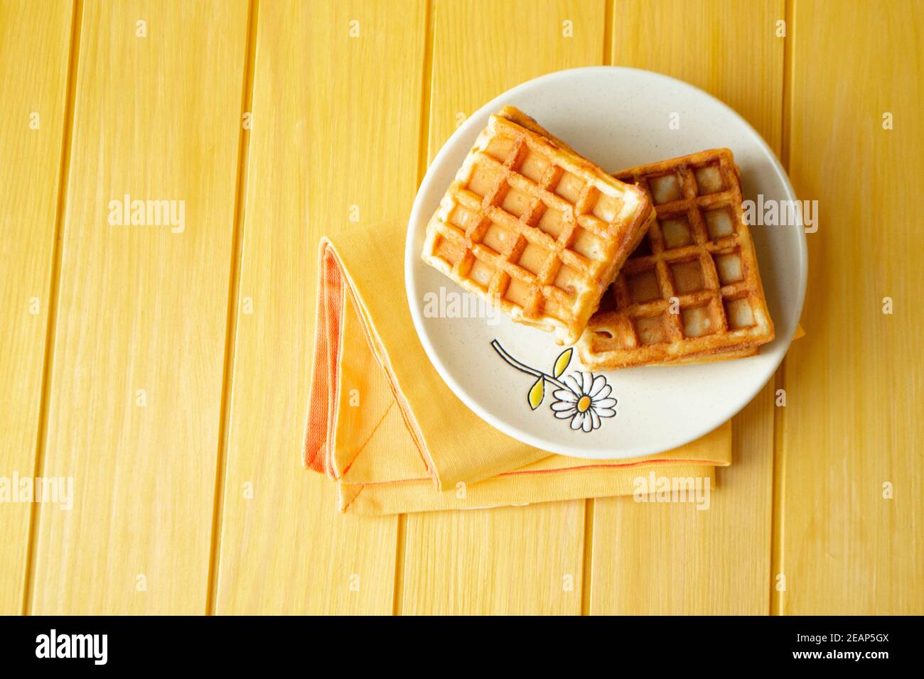 Pile of sweet waffles isolated on white background Stock Photo - Alamy