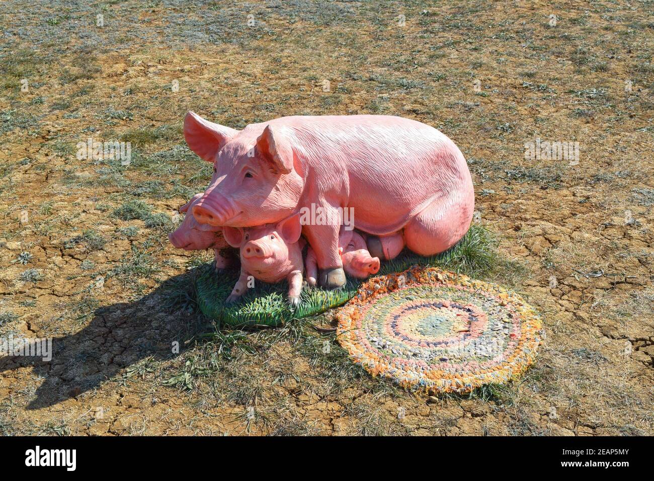 Plastic toy pig. Figures pigs on the lawn Stock Photo - Alamy