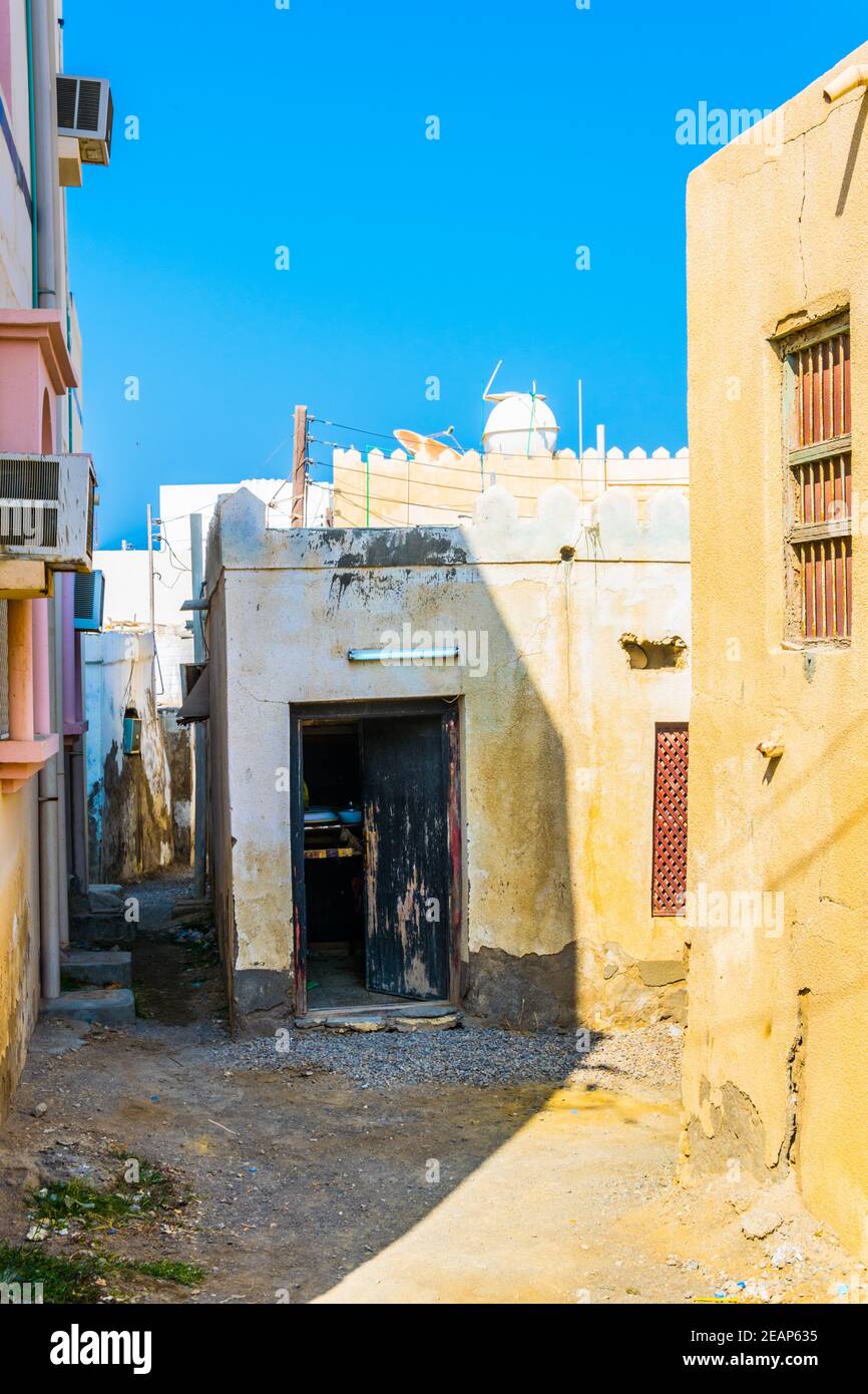 View of a narrow street of the Omani city Sur Stock Photo - Alamy
