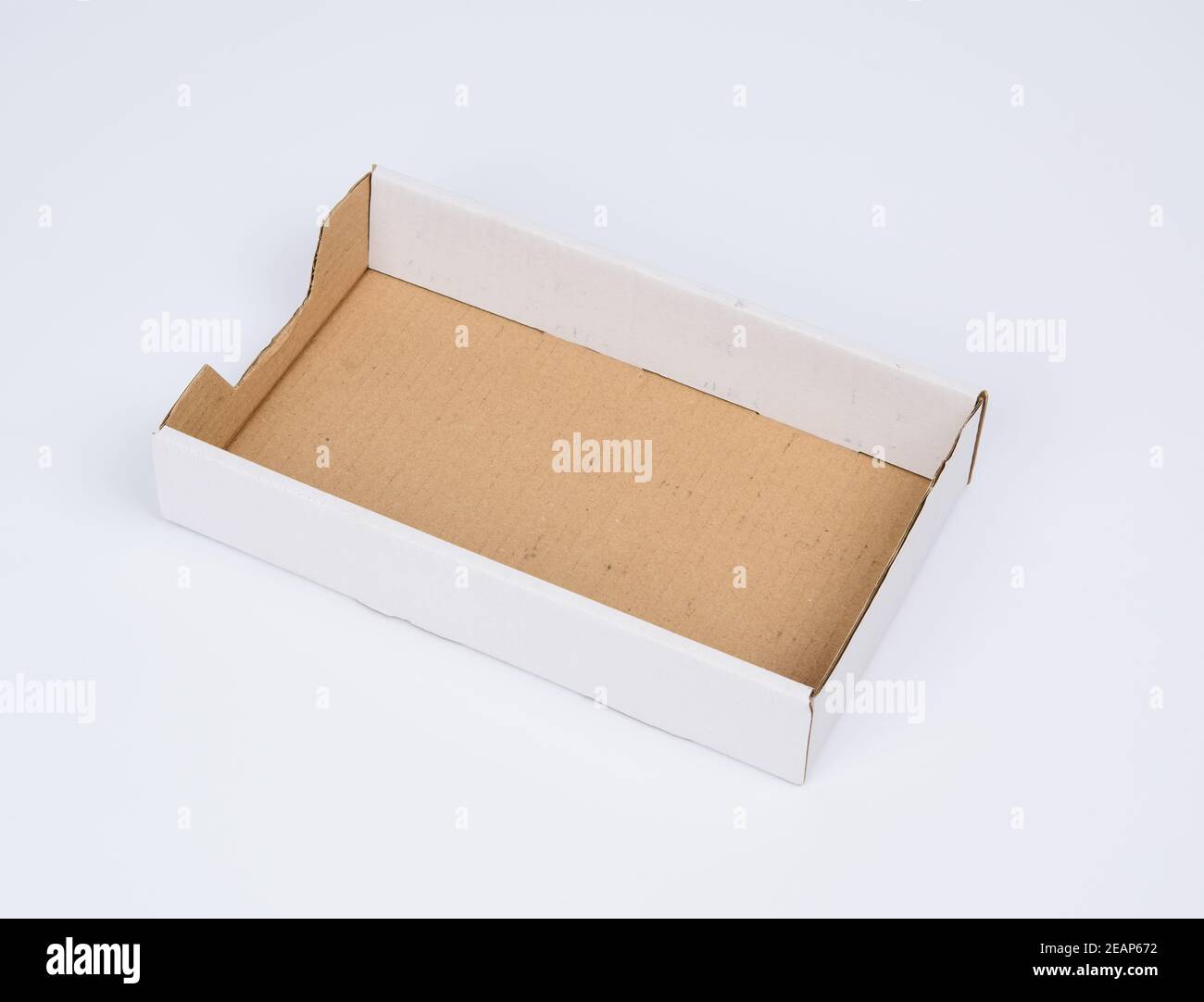 rectangular empty cardboard box of brown paper on a white background ...