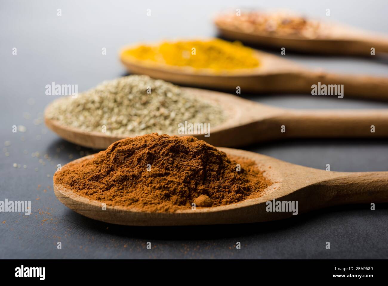 variety of spices on spoon Stock Photo - Alamy