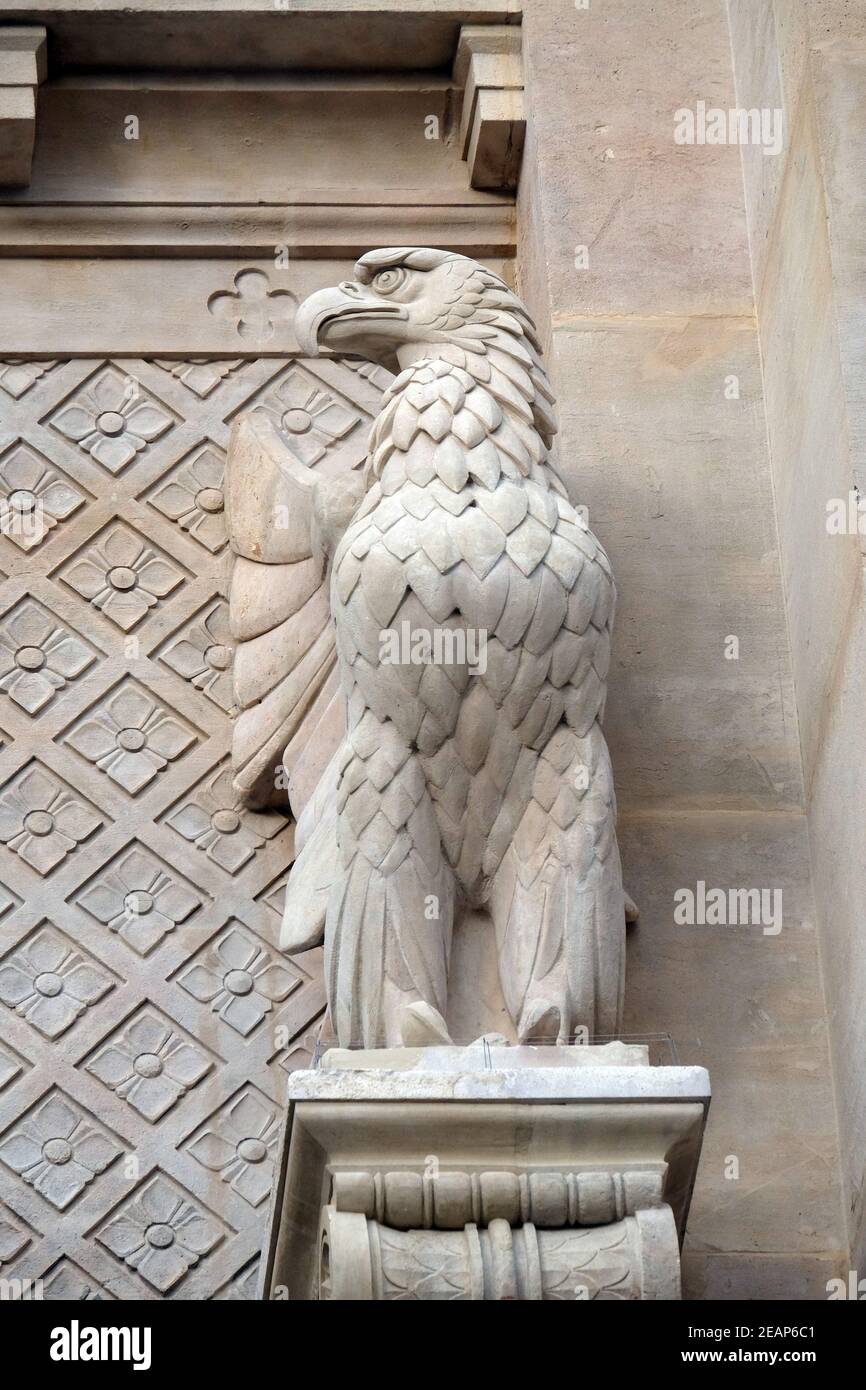 Eagle symbol of St. John the Evangelist, statue on the facade of Saint ...