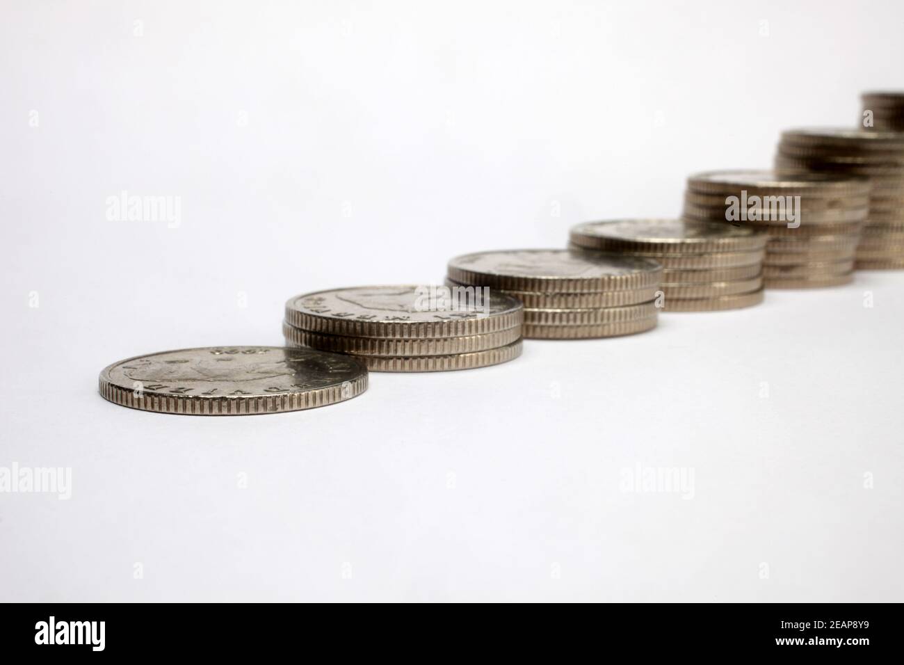 Stacks of money coins Stock Photo - Alamy