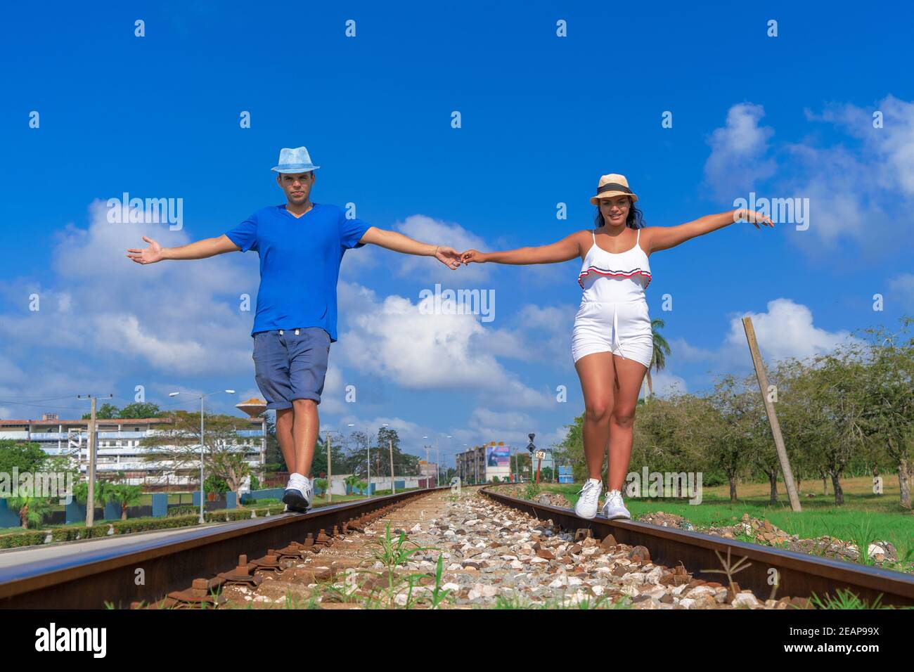 Young couple walking on railway hi-res stock photography and images - Alamy