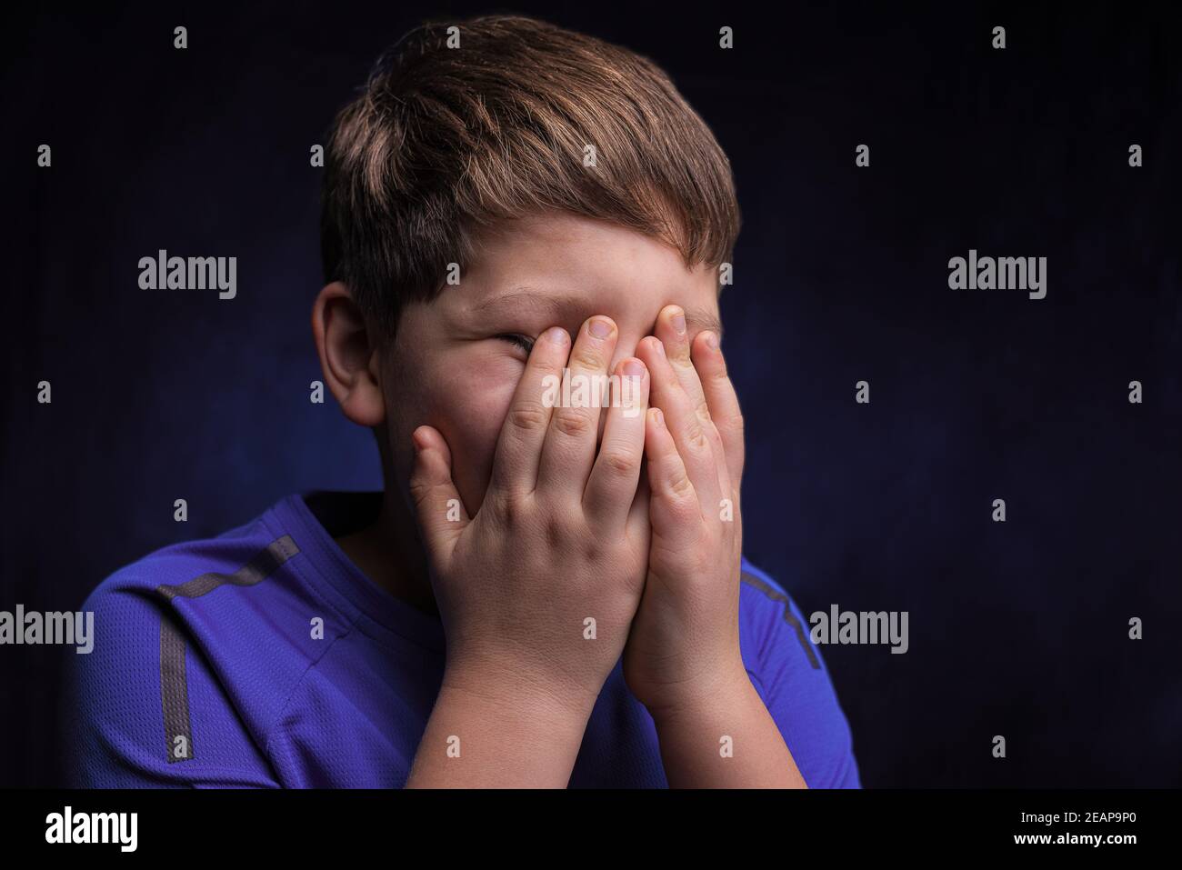 Teen Boy Covering Face High Resolution Stock Photography and Images - Alamy