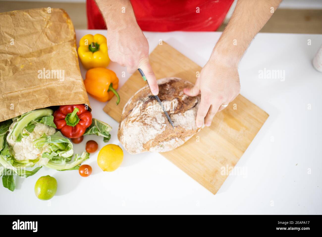 Top view male hands cutting hi-res stock photography and images - Alamy